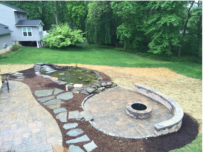 Why You Need an Outdoor Fireplace this Fall - Carroll Landscaping, Inc.